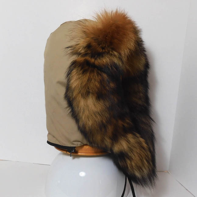 When the tape is sewn to the outer edge of the hood the fur rolls to ...